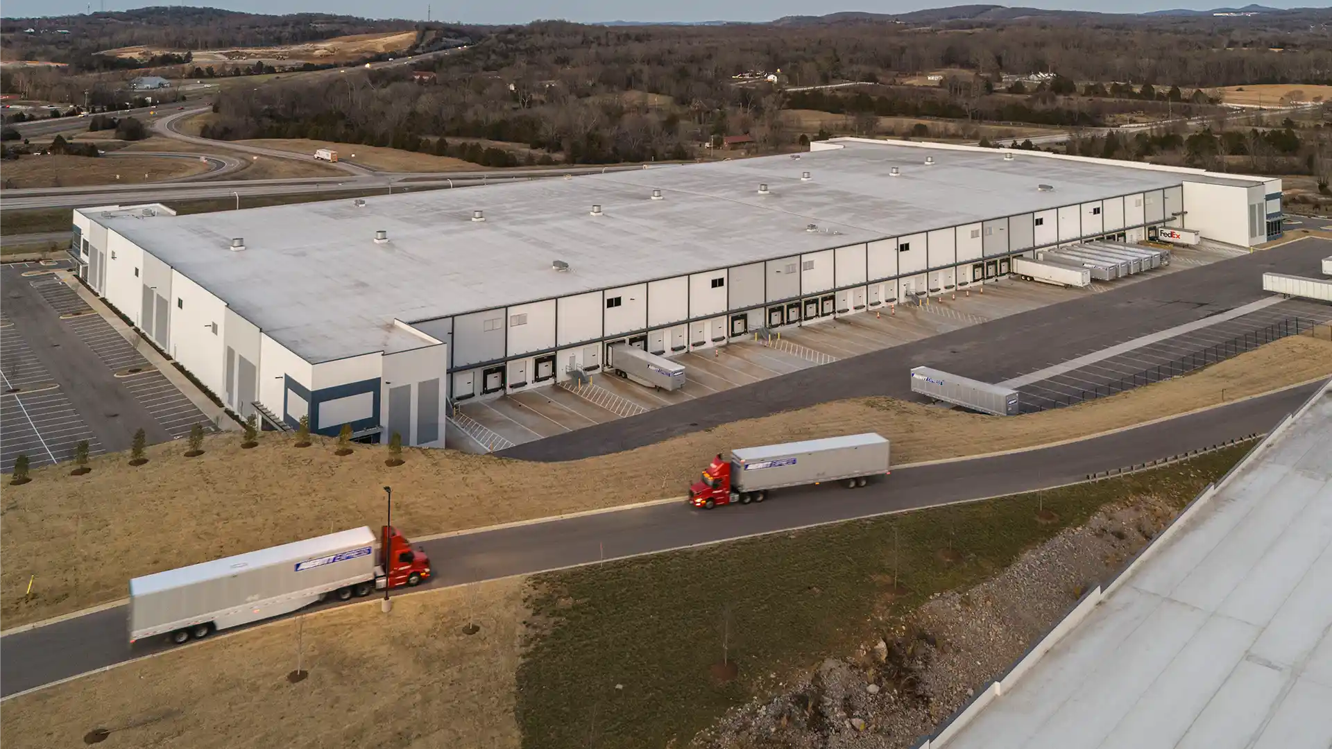 Dedicated Shuttle Transportation for Multi-Facility Operations